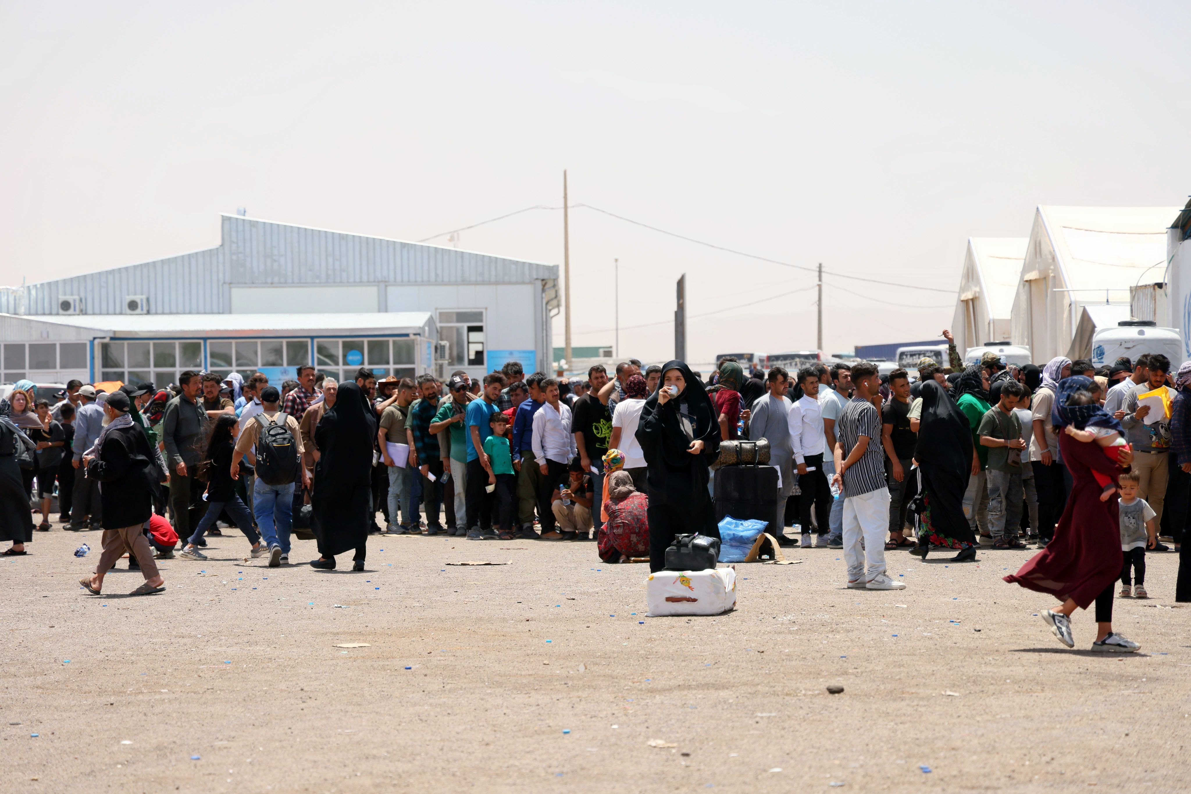 Afghan Returnees from Iran are Welcomed by Heat, Hunger, and ...
