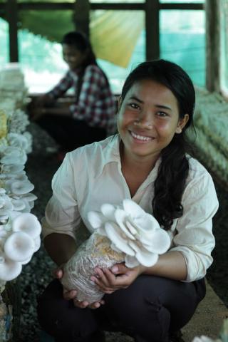 Growing mushrooms helps Chanthou save money for her education | World ...